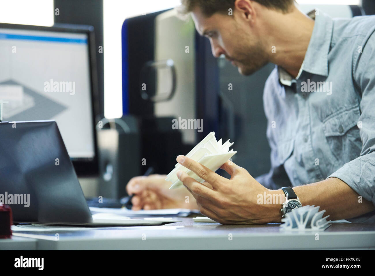 Engineer working in office Stock Photo - Alamy