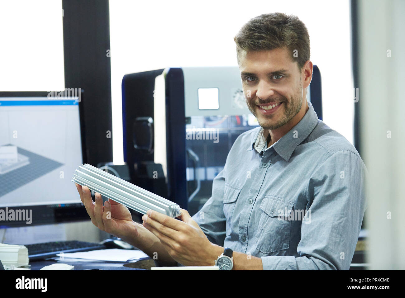 Engineer working in office Stock Photo - Alamy