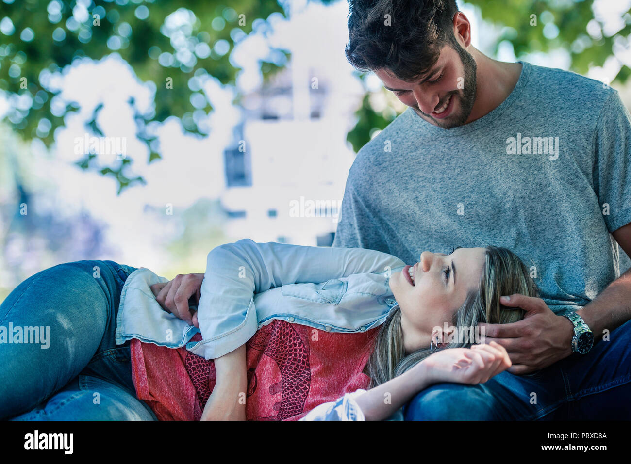 Woman sitting on mans lap hi-res stock photography and images - Alamy