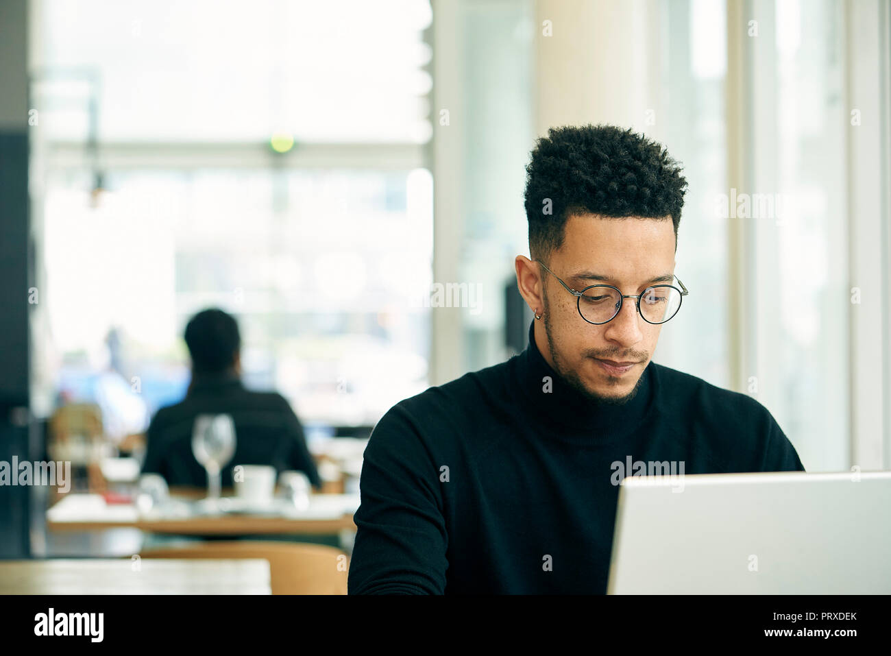 Businessman using laptop Stock Photo - Alamy