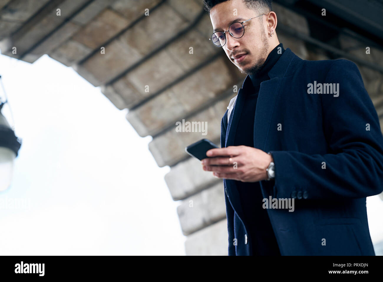 Businessman using smartphone Stock Photo - Alamy