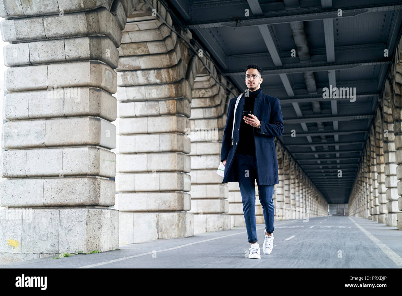 Man holding column hi-res stock photography and images - Alamy