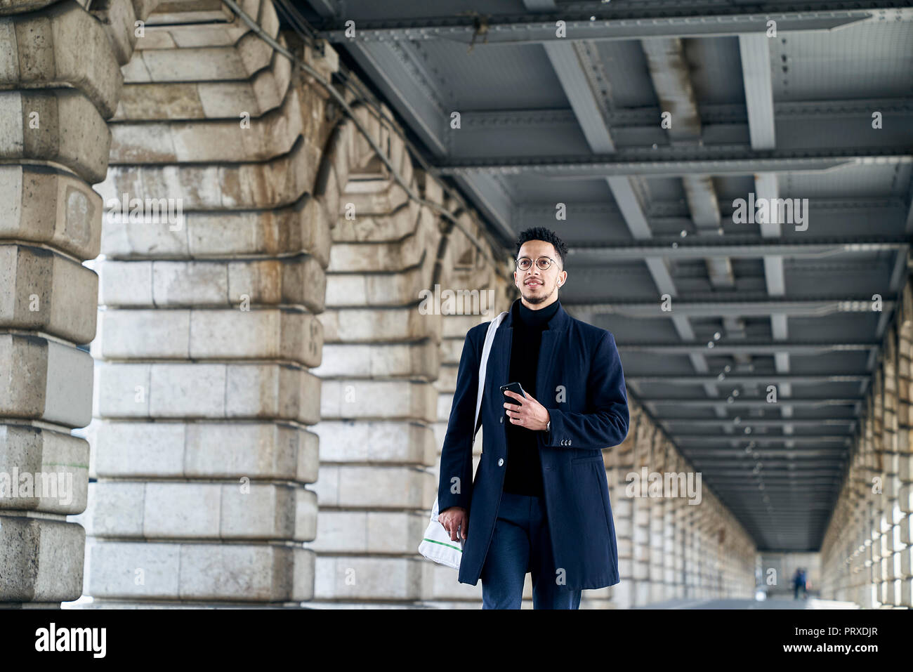 Man holding column hi-res stock photography and images - Alamy