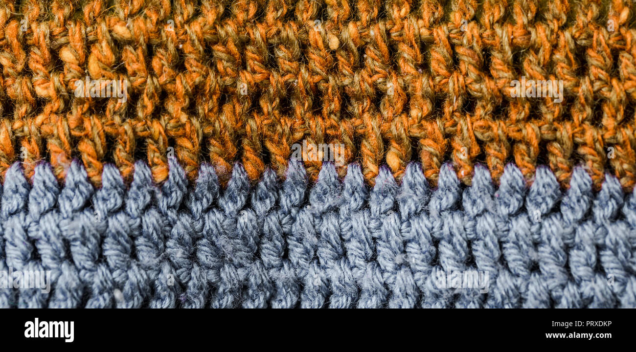 multi-colored knitted cosy texture closeup background,the concept of ...