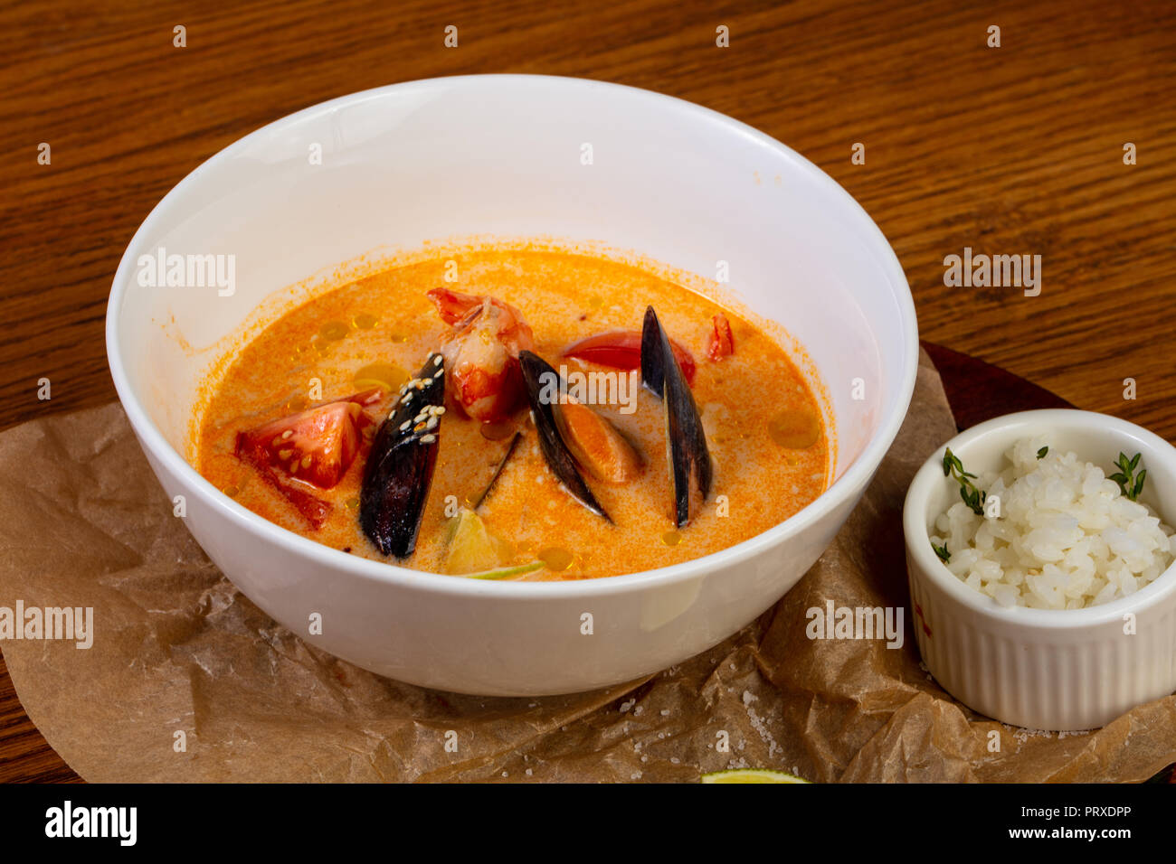 Thai Tom Yam soup with seafood Stock Photo - Alamy