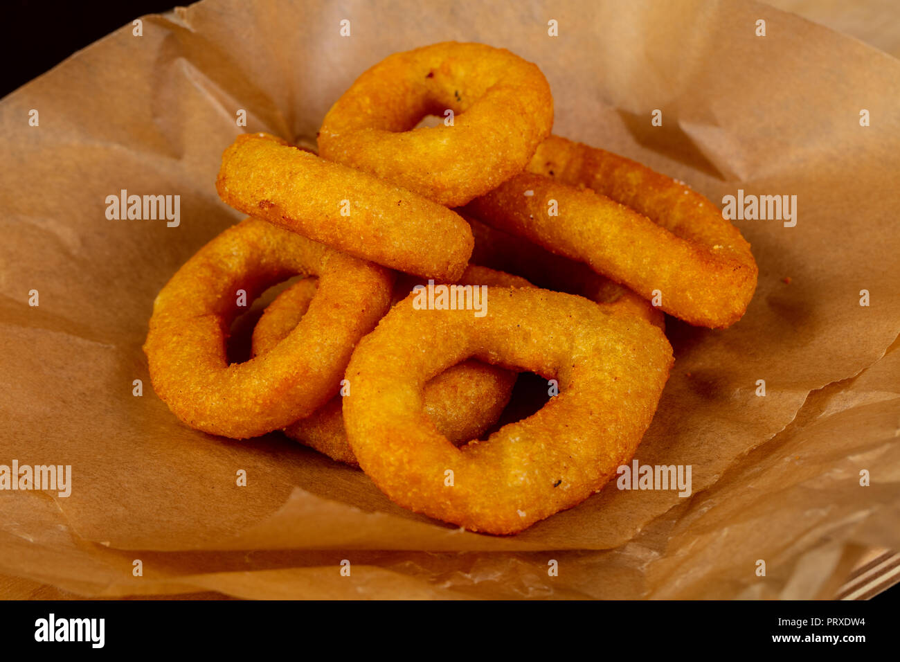 Hot tasty Fried squid rings Stock Photo - Alamy