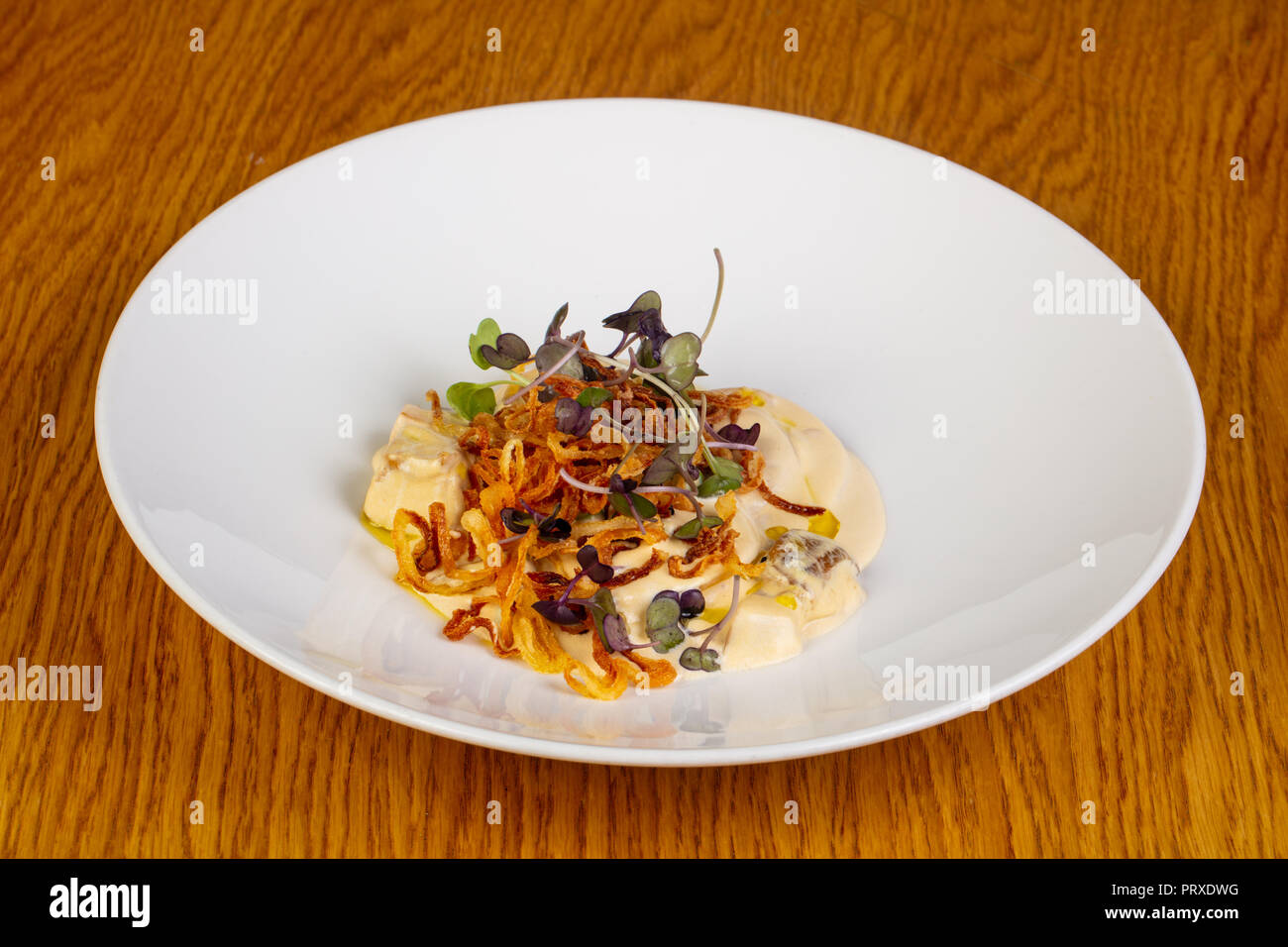 Ravioli with rabbit and sauce Stock Photo - Alamy