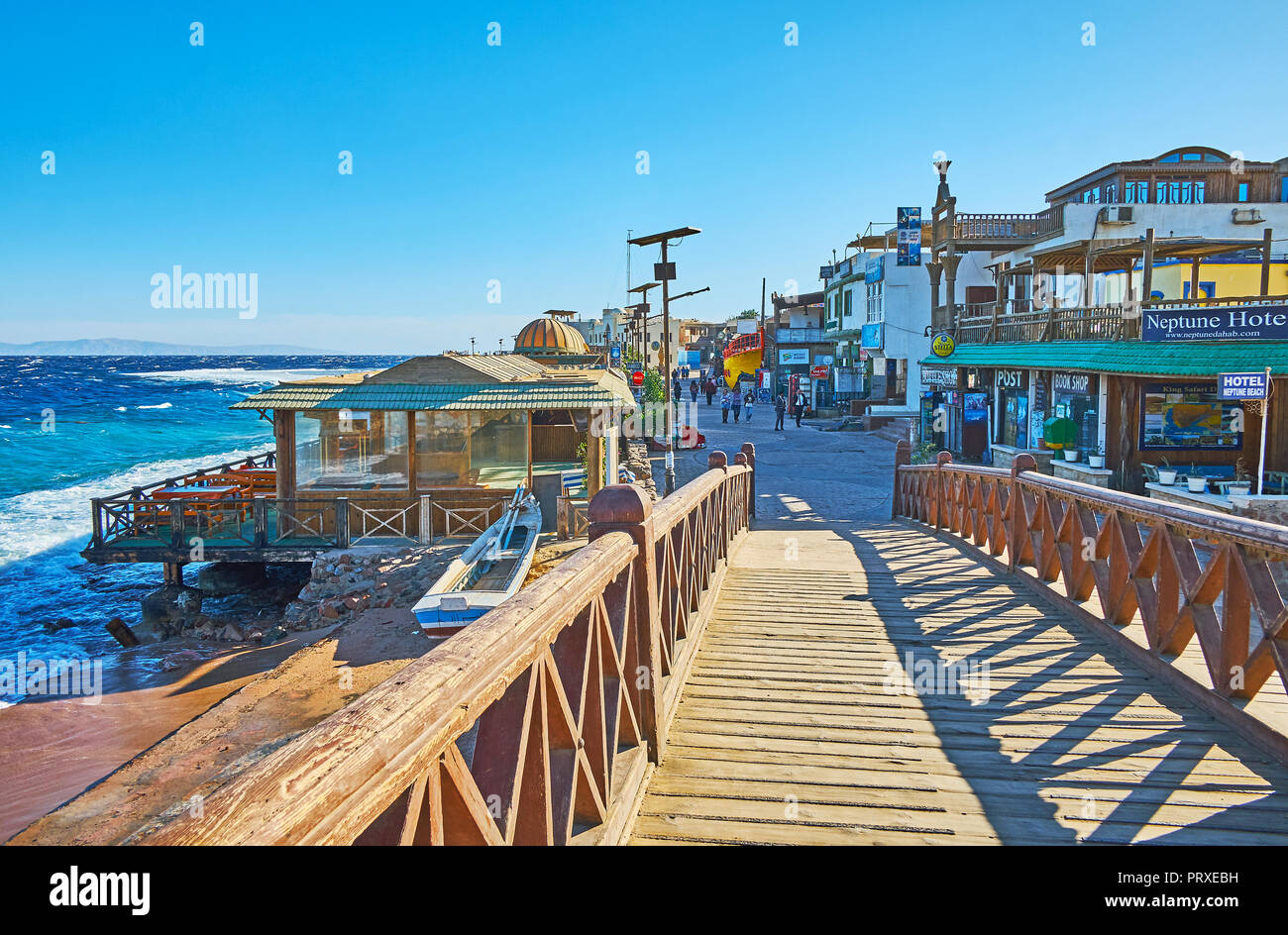DAHAB, EGYPT - DECEMBER 25, 2017: Walk the seaside promenade, occupied ...