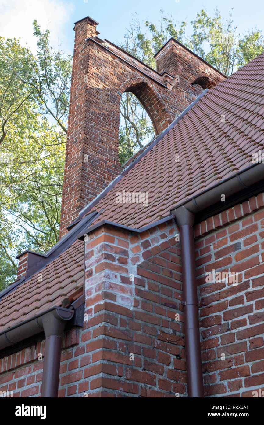 An old church in Central Europe. A religious building of red brick ...