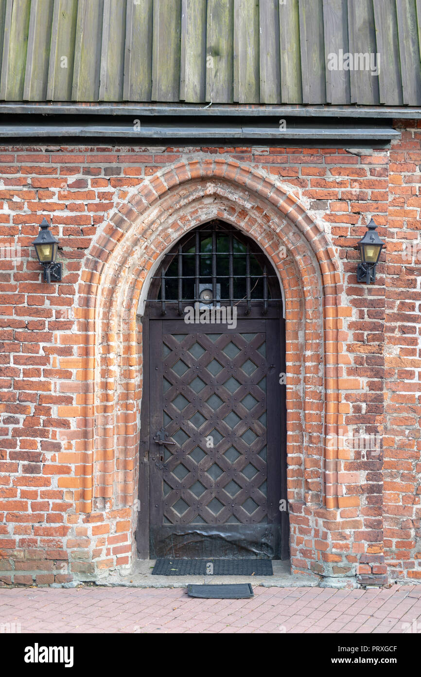 An old church in Central Europe. A religious building of red brick ...