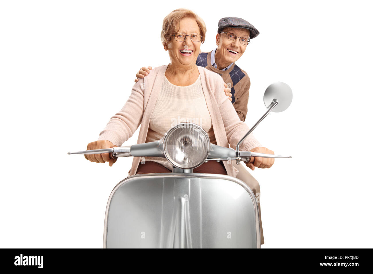 Cheerful seniors riding a vintage scooter isolated on white background ...