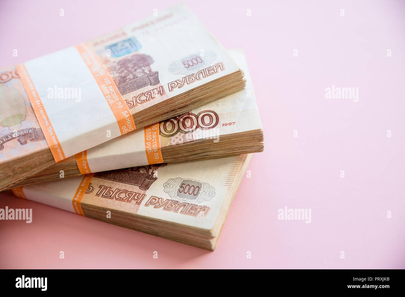 Heap of five thousand russian rubles banknotes.batch of 5000 Russian ...