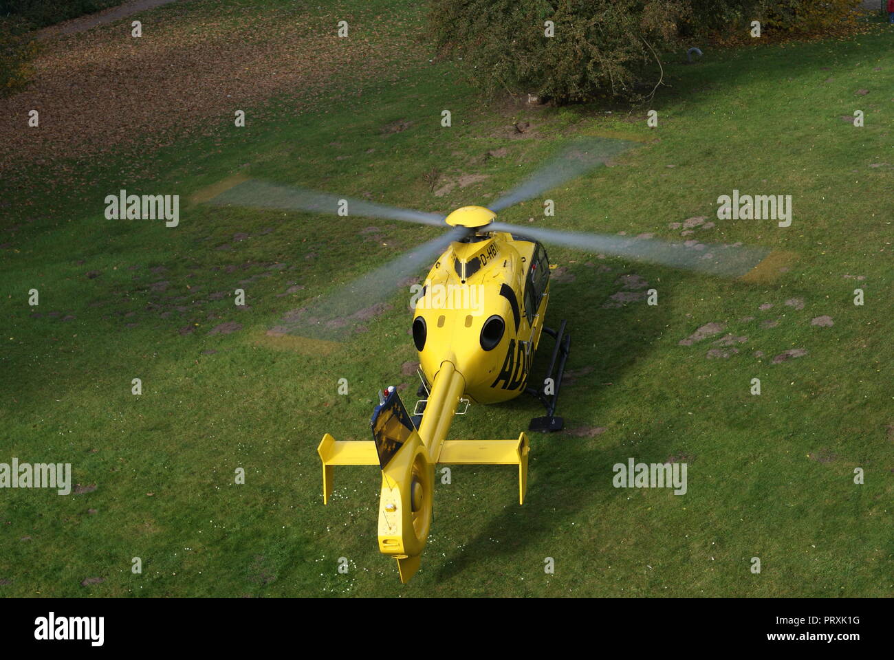 Helicopter start in blue sky with clouds emergency call helicopter ...