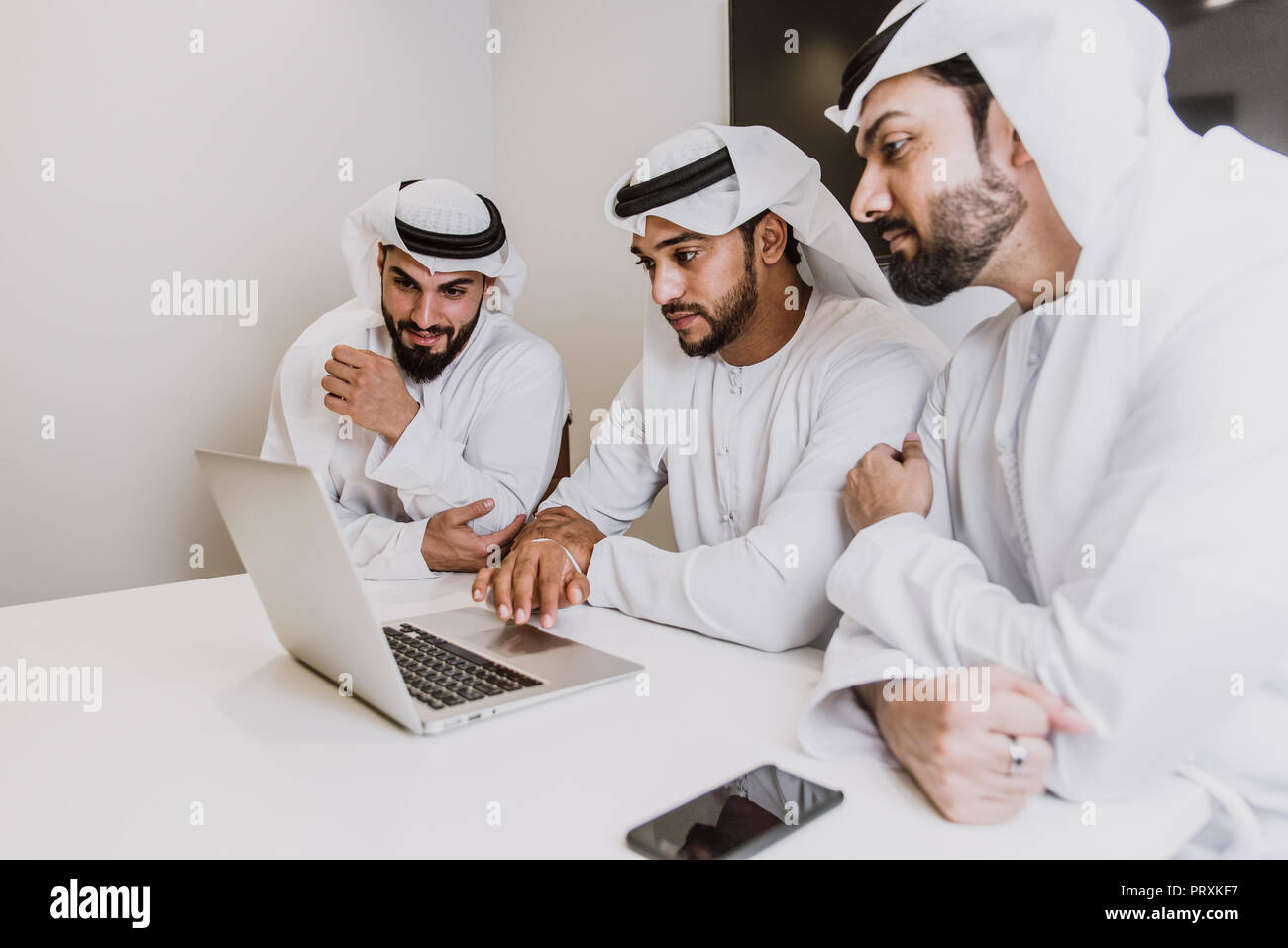 Arabic business team in the office Stock Photo - Alamy