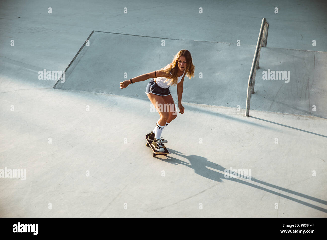 Beautiful skater girl lifestyle moments in a skatepark Stock Photo - Alamy
