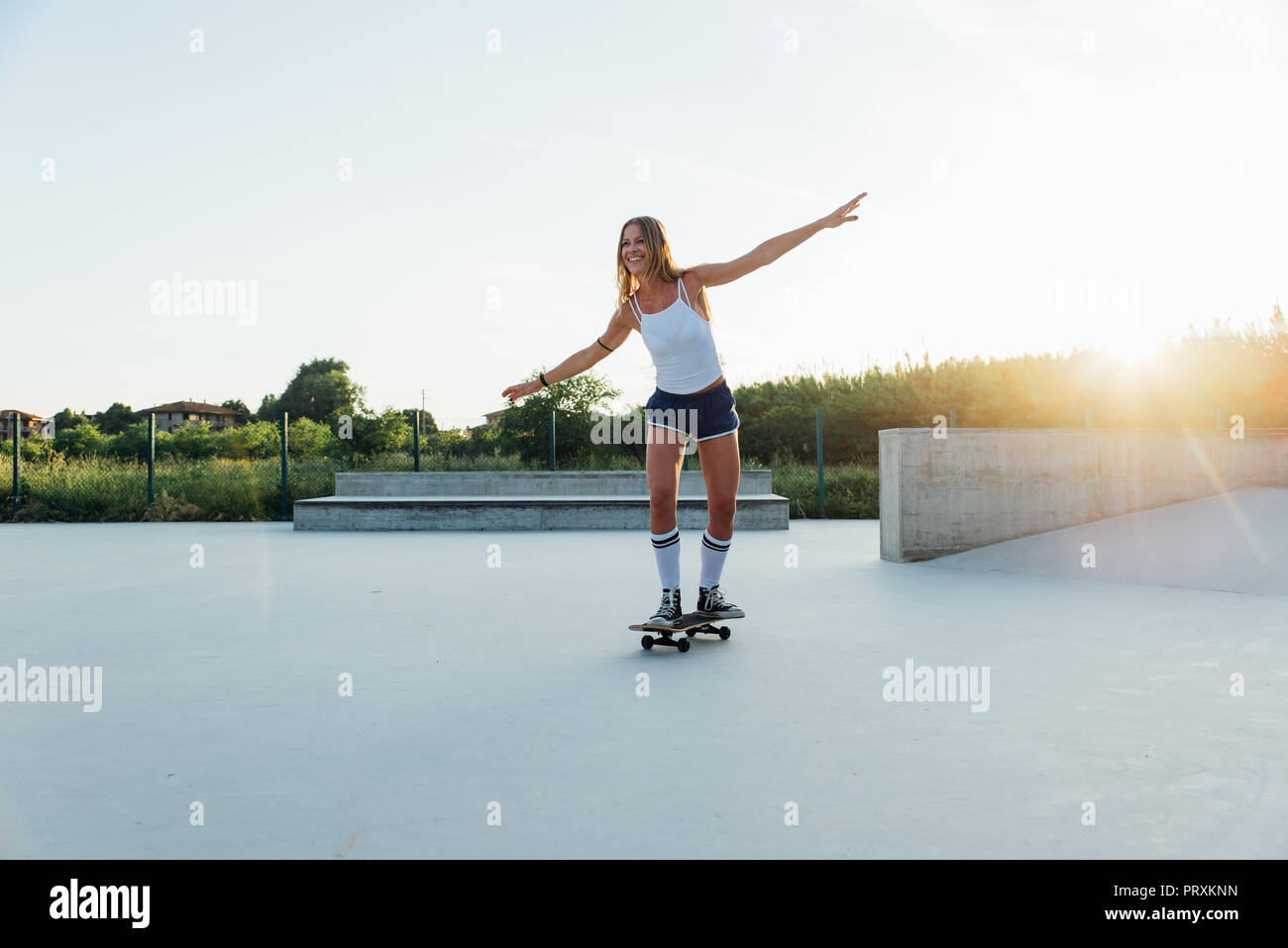 Beautiful skater girl lifestyle moments in a skatepark Stock Photo - Alamy