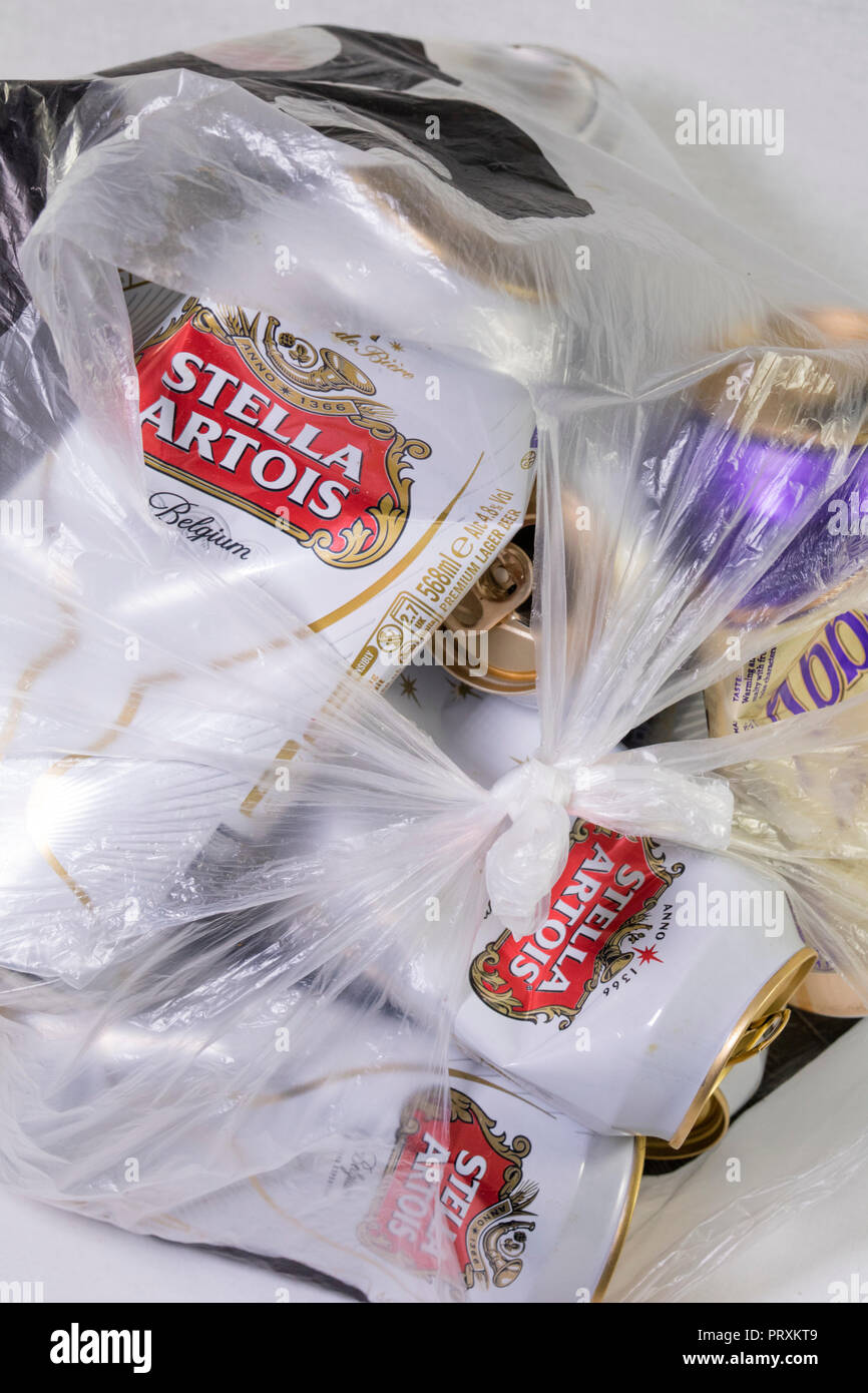 Beer and Larger cans in a plastic bag, England, UK Stock Photo - Alamy