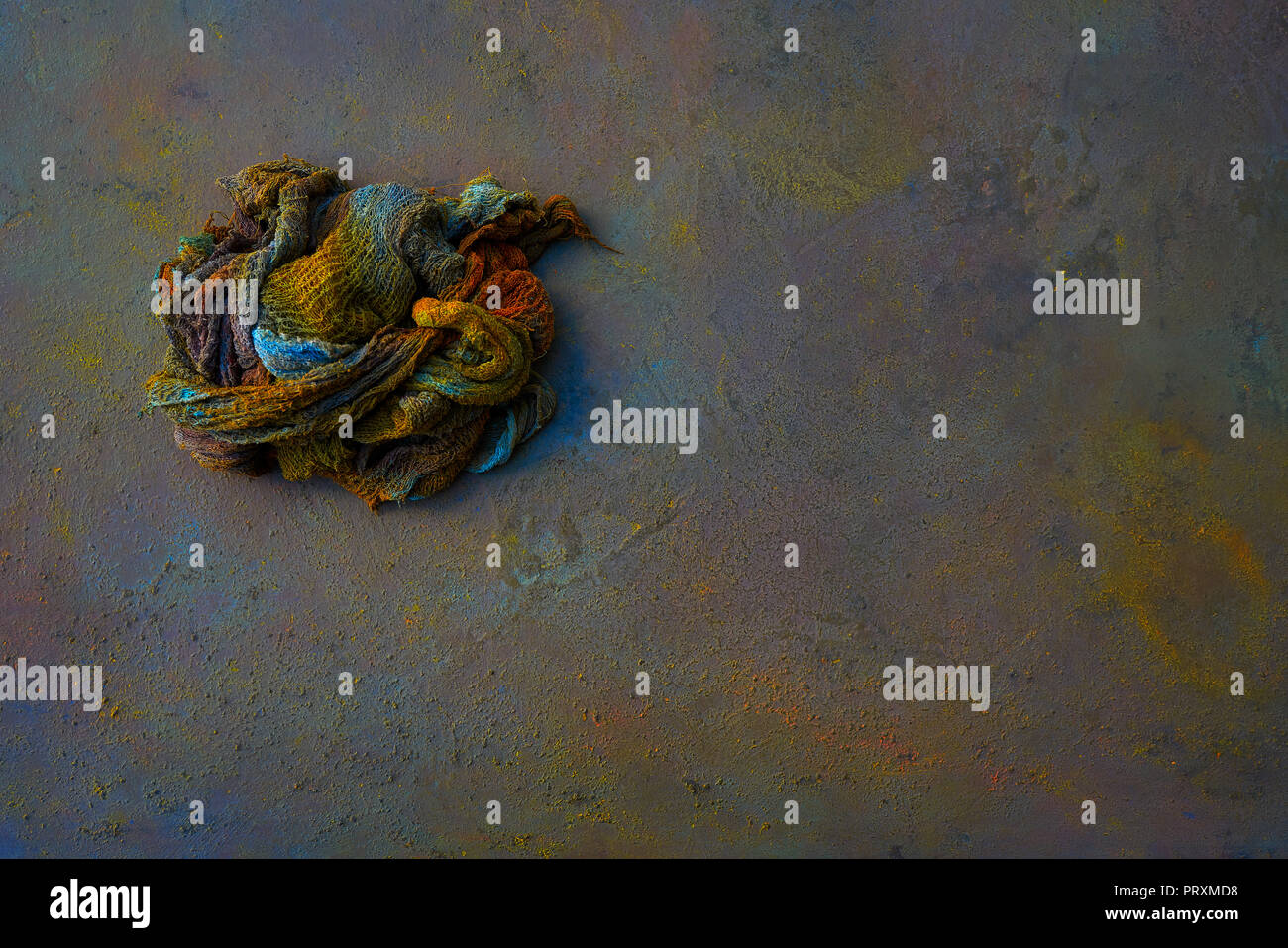 Colorful rag on oxide painted background Stock Photo - Alamy