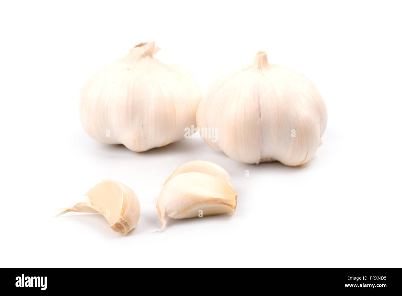 two garlics on white background Stock Photo - Alamy