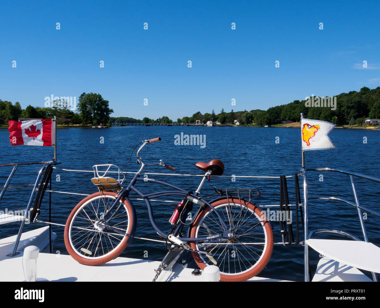 A boat approaches Brass Point Bridge, Rideau Canal, Ontario Stock Photo ...