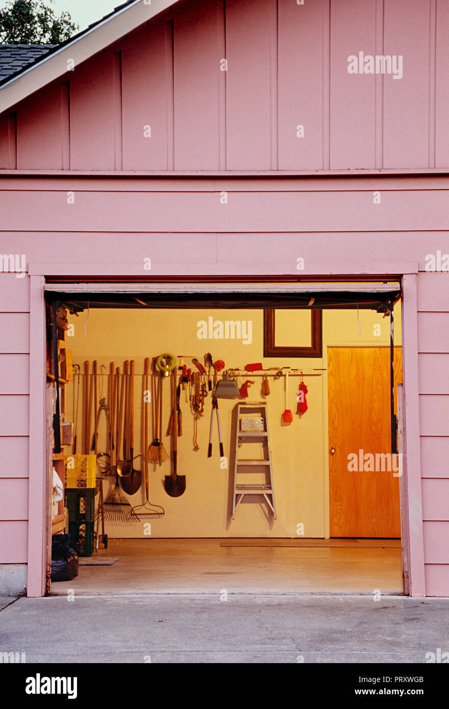 Suburban house garage doors open at night, USA Stock Photo - Alamy