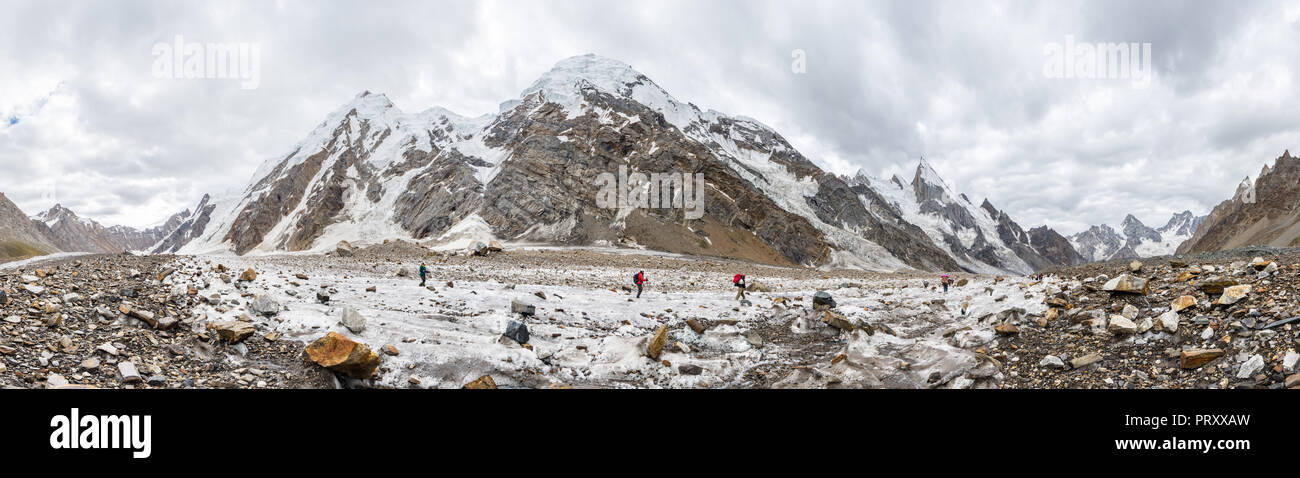 Trekkers walking towards Hushe valley, Gondogoro glacier, Karakoram ...