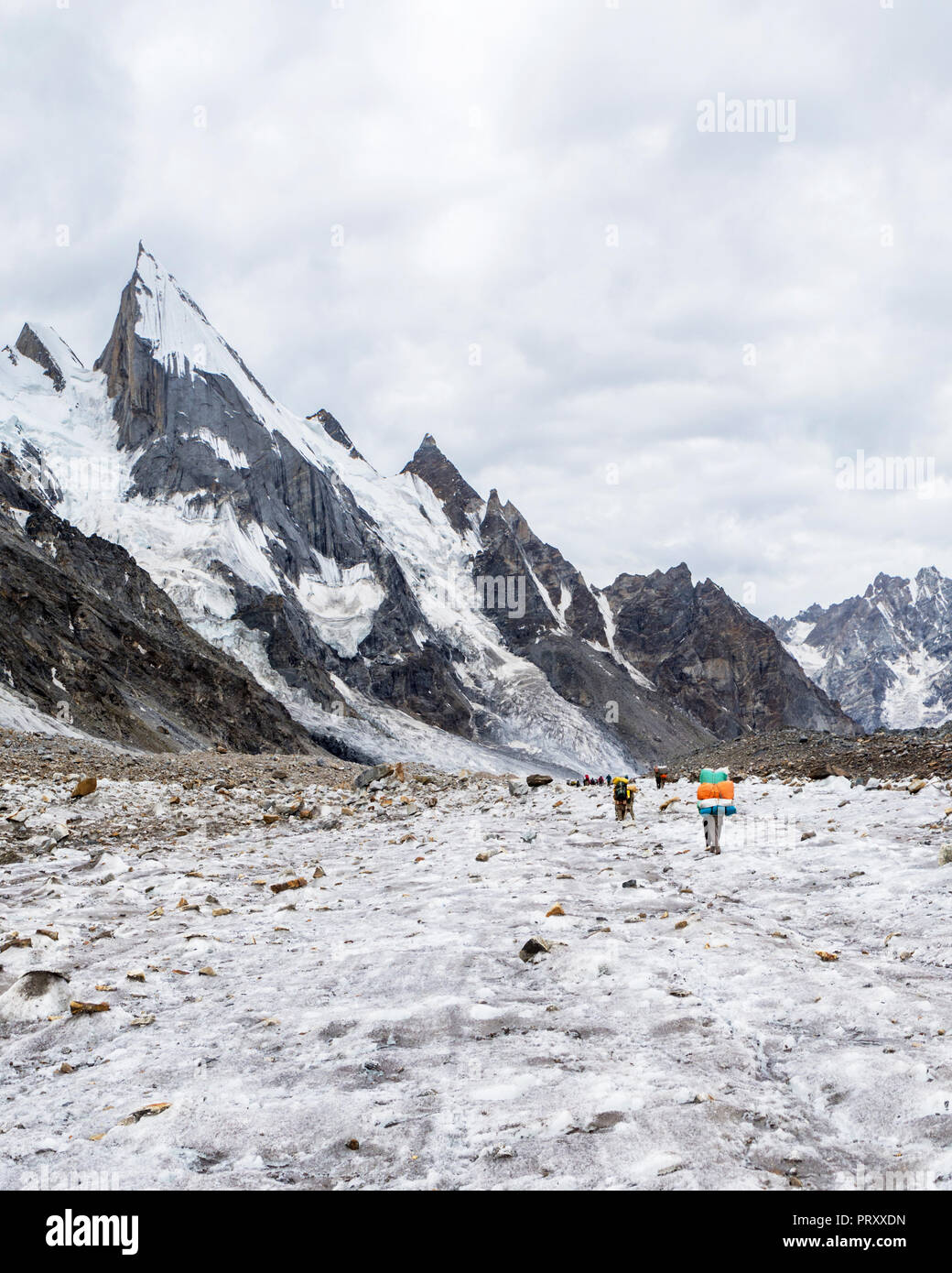 Trekkers walking towards Hushe valley, Gondogoro glacier, Karakoram ...