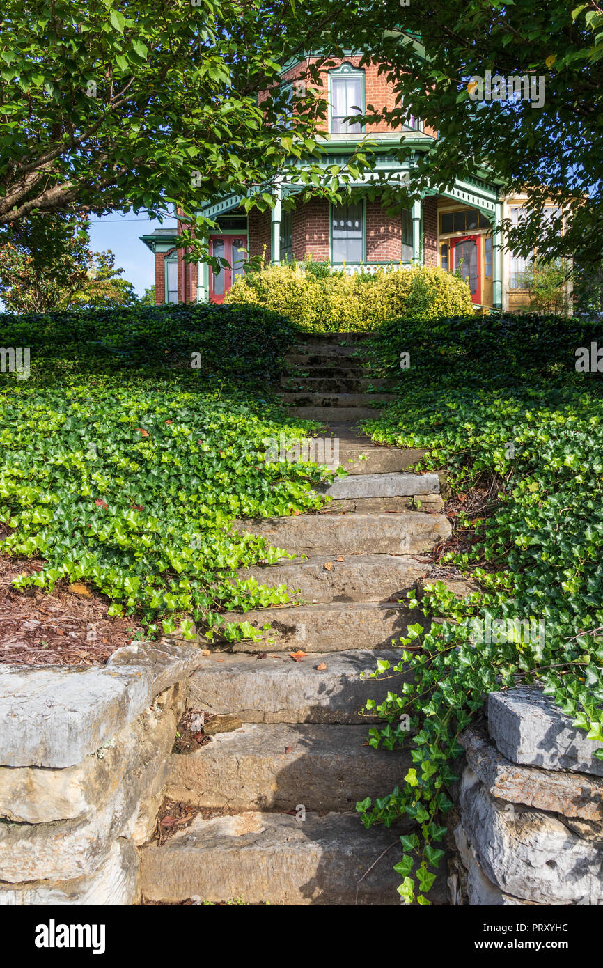 JONESBOROUGH, TN, USA-9/29/18: Rock steps lead from the sidewalk on ...