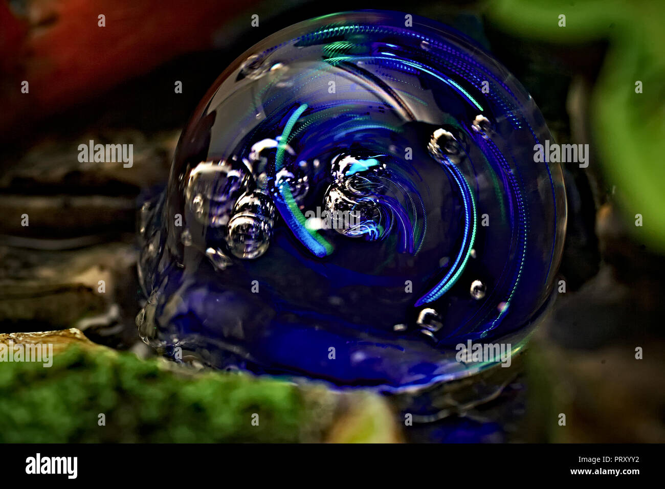 sparkling ball in water. holiday, light, green Stock Photo - Alamy