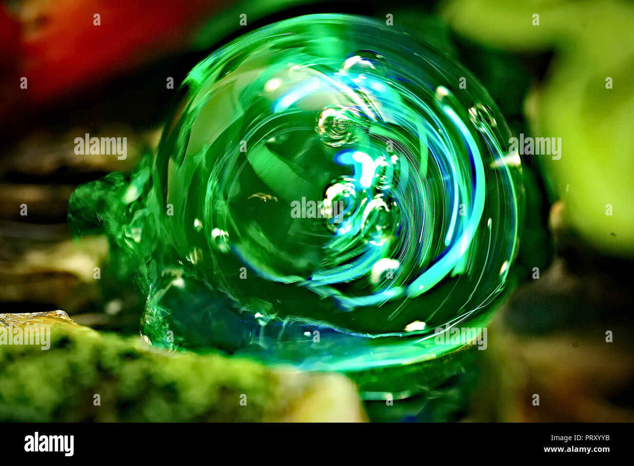 sparkling ball in water. holiday, light, green Stock Photo - Alamy