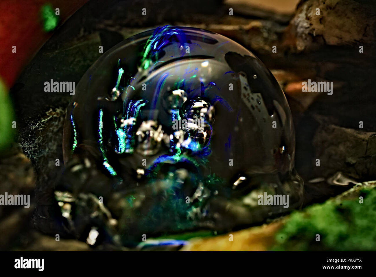 sparkling ball in water. holiday, light, green Stock Photo - Alamy