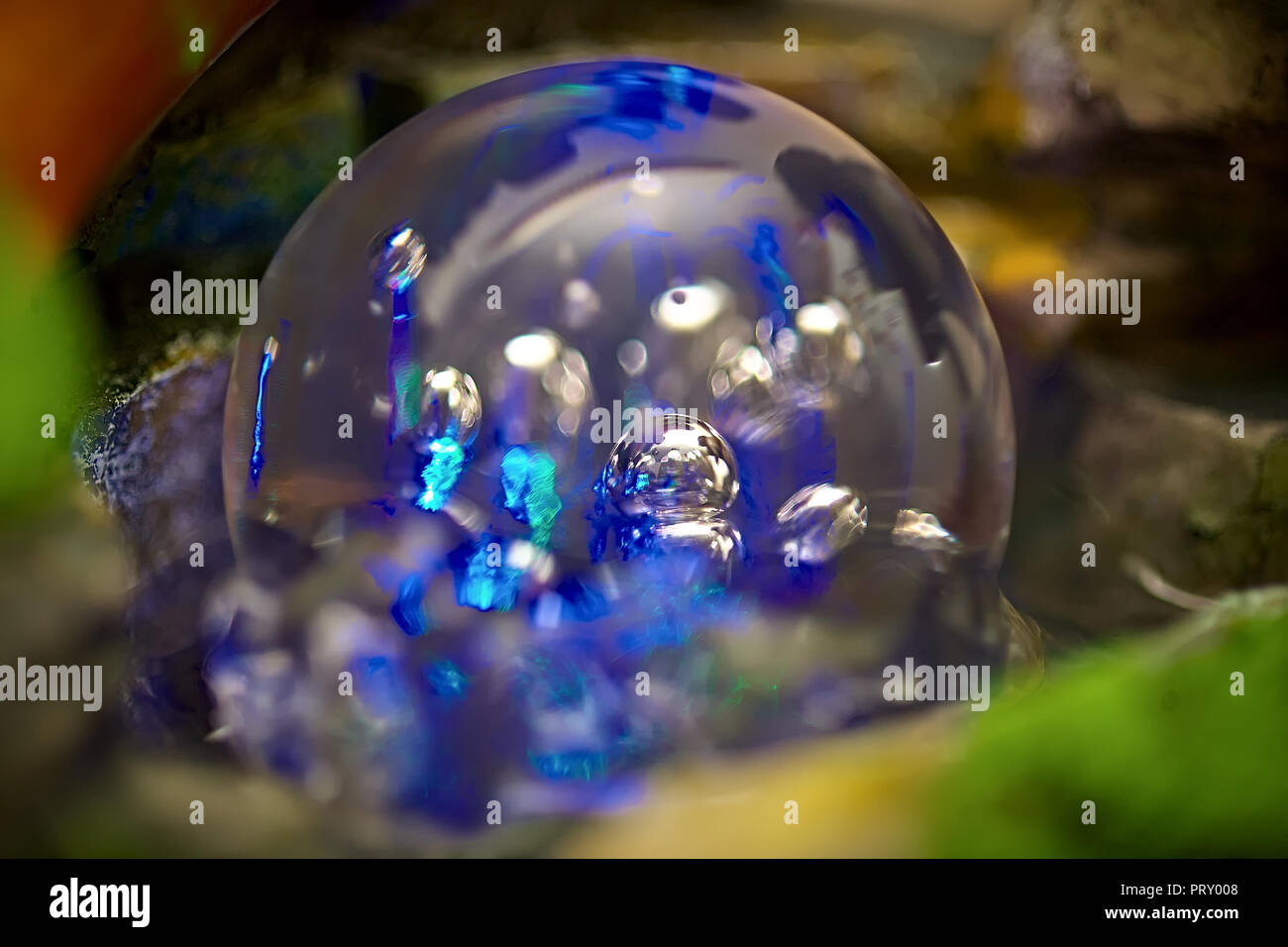 sparkling ball in water. holiday, light, green Stock Photo - Alamy