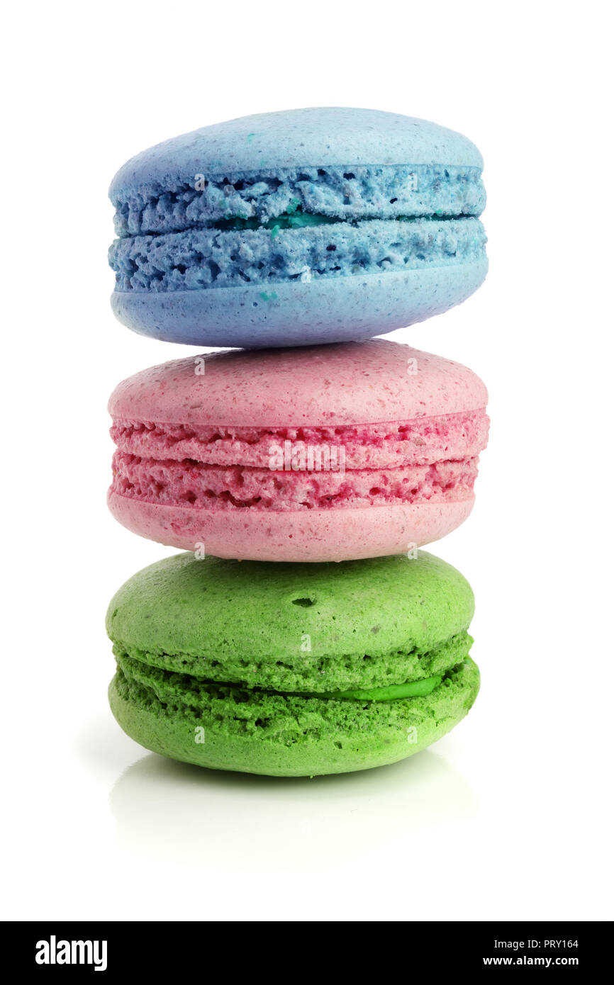 three macaroons isolated on white background closeup Stock Photo - Alamy
