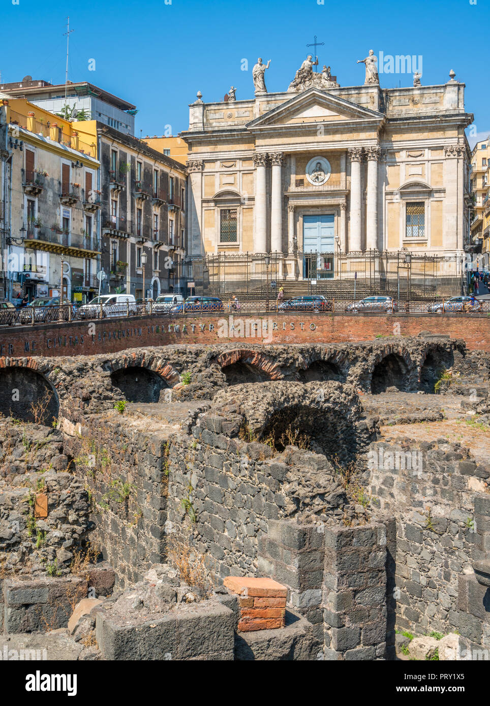 The roman amphitheater with San Biagio Church in Catania in a summer ...