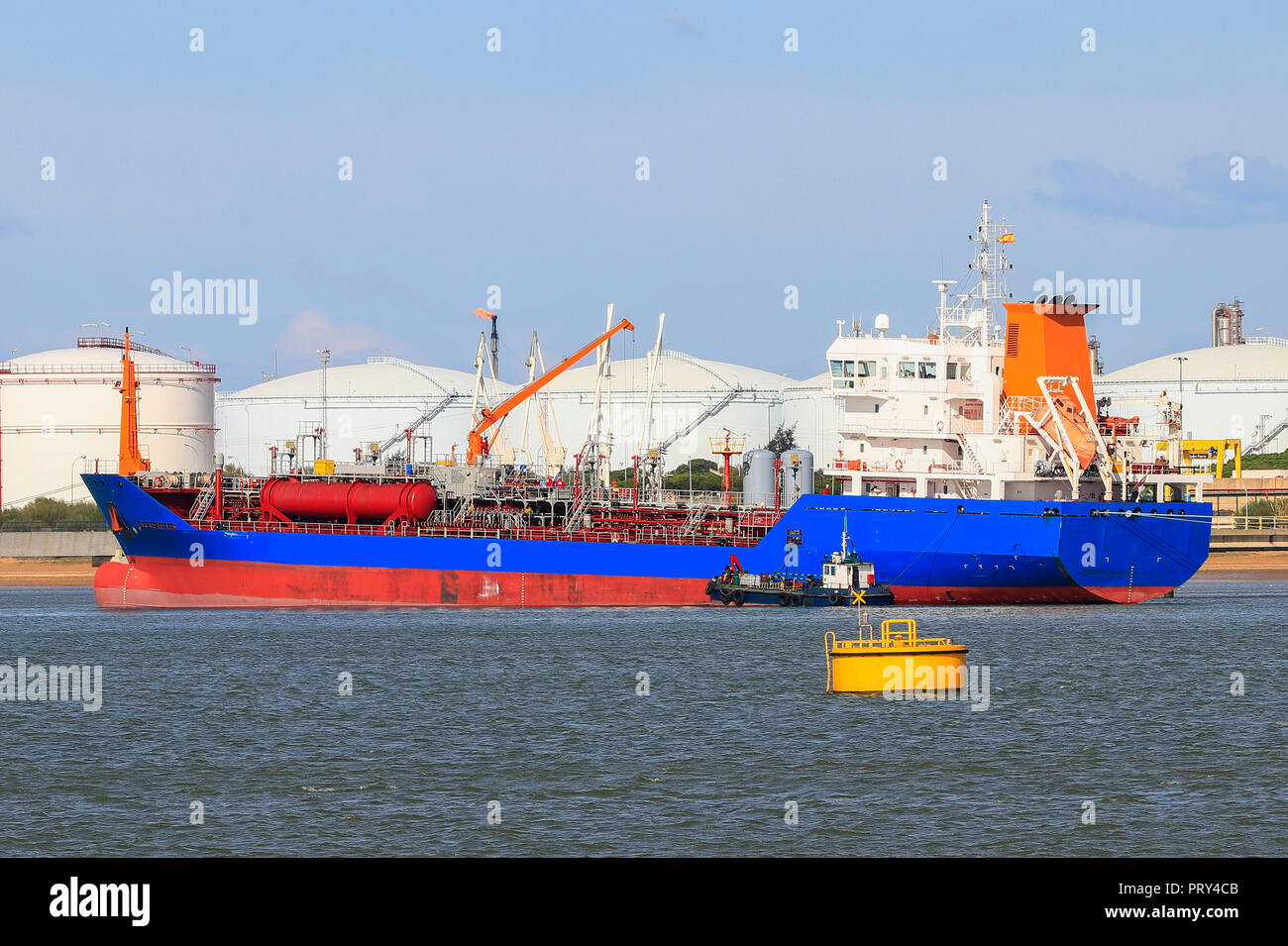Cargo ship loading. Logistics and transportation with working crane ...