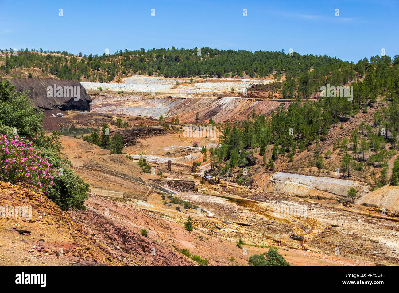 Copper dross landscape with bridge supports Stock Photo - Alamy