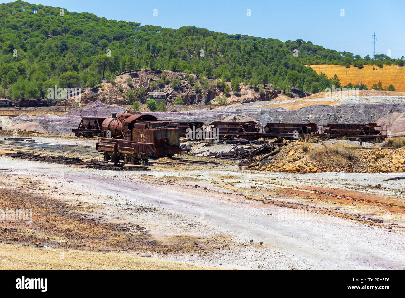 Back side of old mining steam locomotive and carriages Stock Photo - Alamy