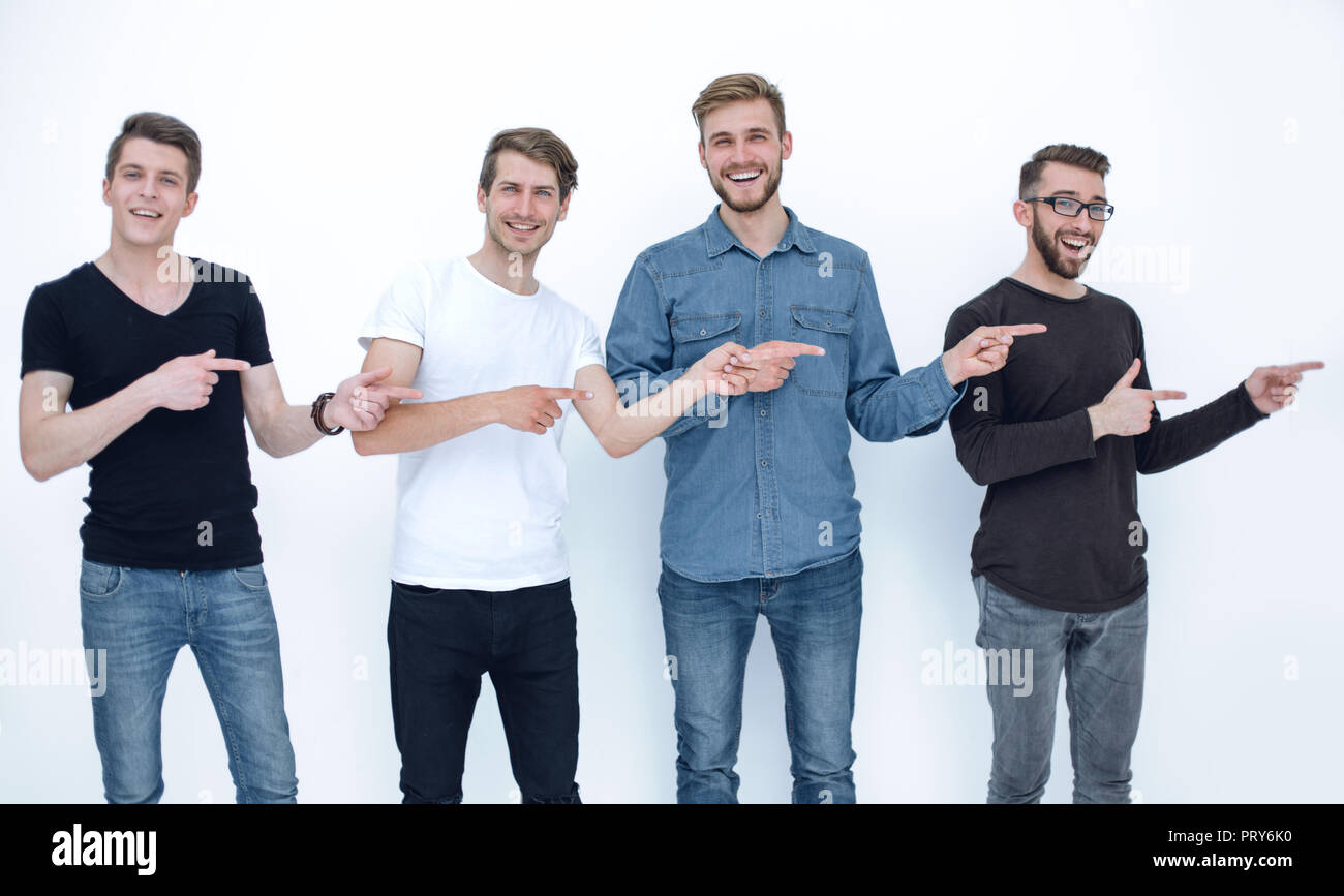 cheerful group of friends showing their fingers to the side Stock Photo ...