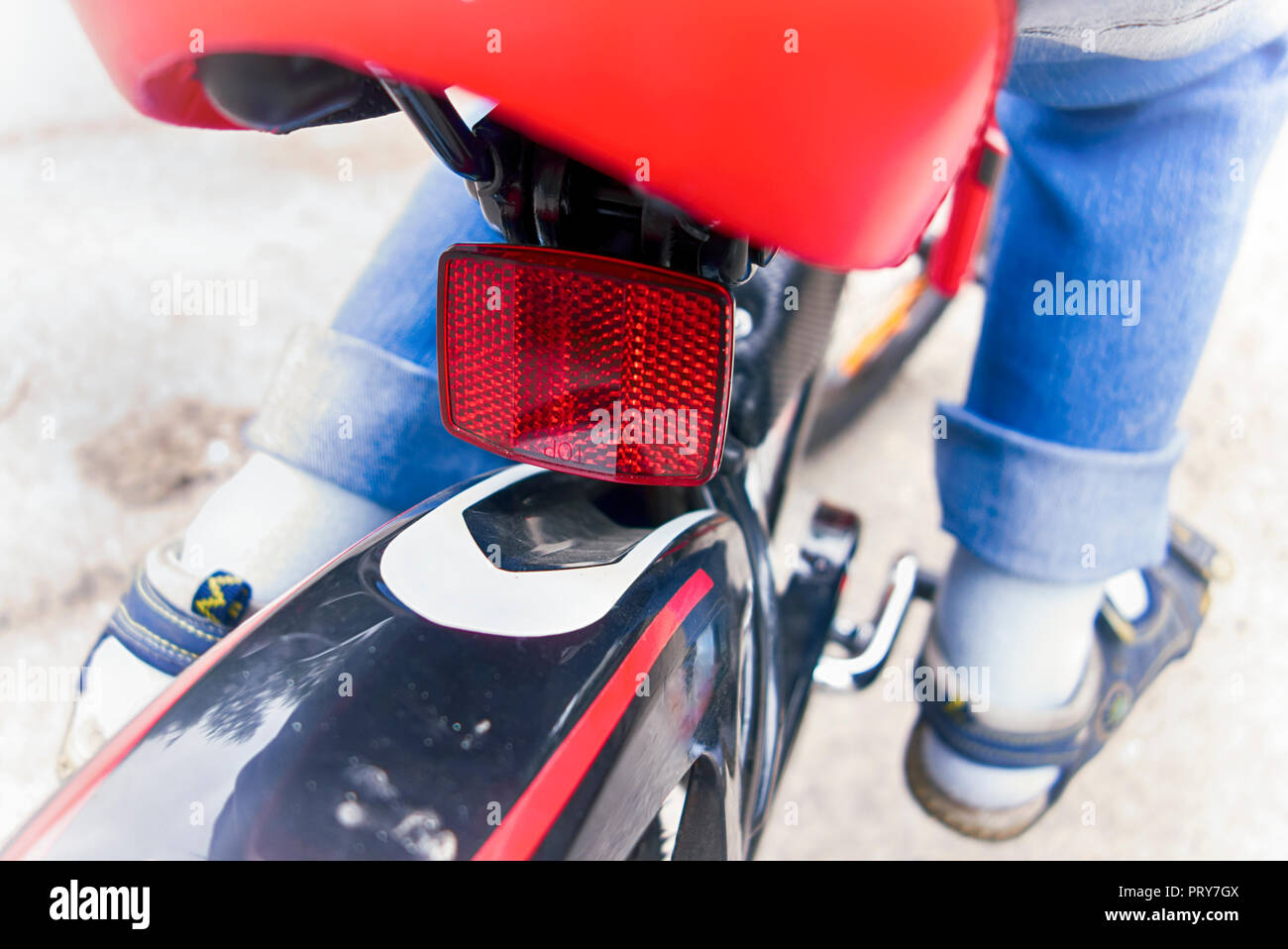 Back view boy on bicycle hi-res stock photography and images - Alamy