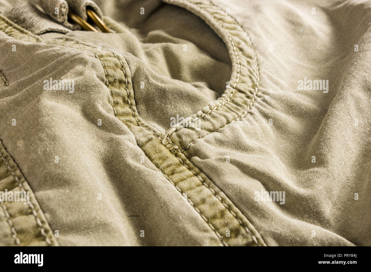 clothing items washed cotton fabric texture with seams, macro, close-up ...