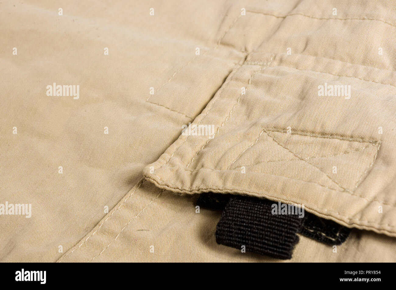 clothing items washed cotton fabric texture with seams, macro, close-up ...