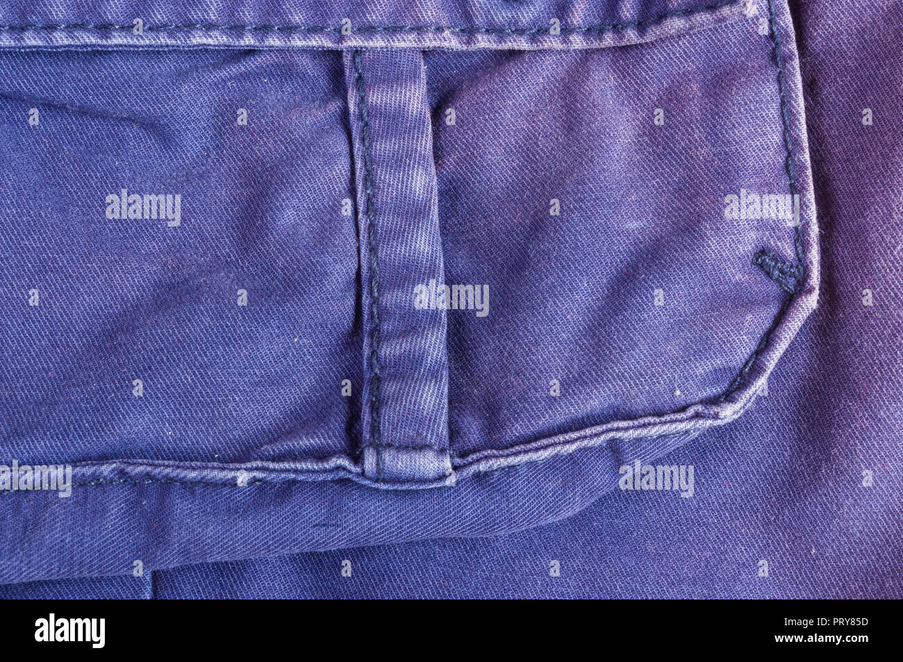 clothing items washed cotton fabric texture with seams, macro, close-up ...