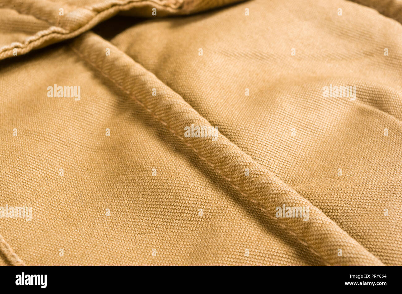 clothing items washed cotton fabric texture with seams, macro, close-up ...