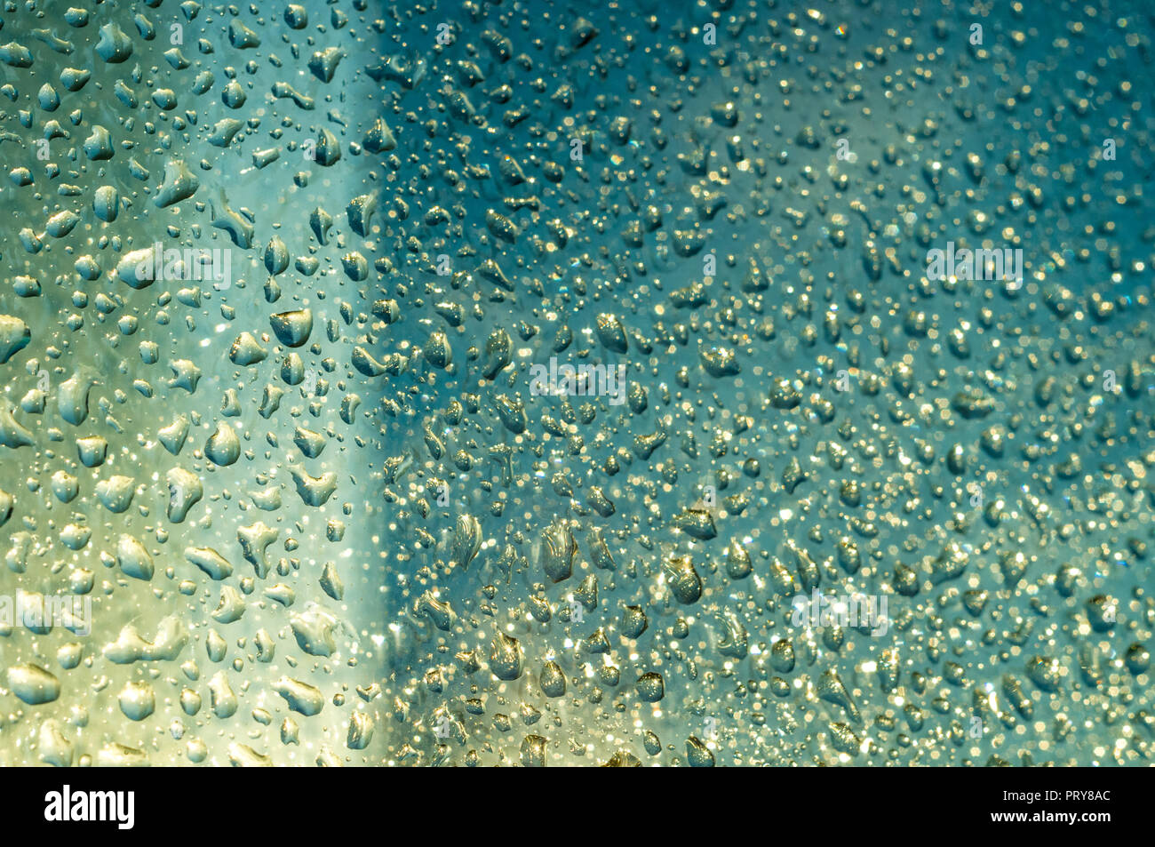 background of raindrops on window glass, toned, close-up Stock Photo ...
