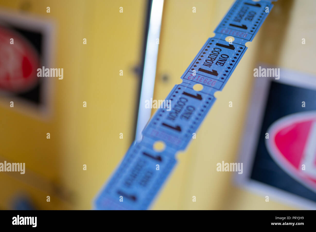 Line of tickets from arcade game center showing one coupon Stock Photo ...