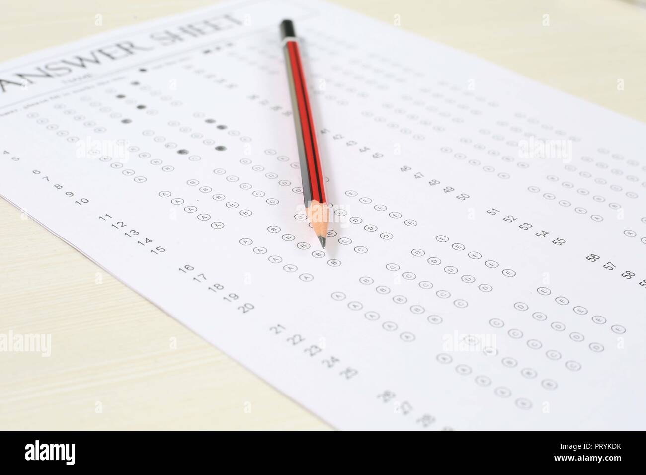 Picture of exam sheet and pencil. Isolated on white background Stock ...