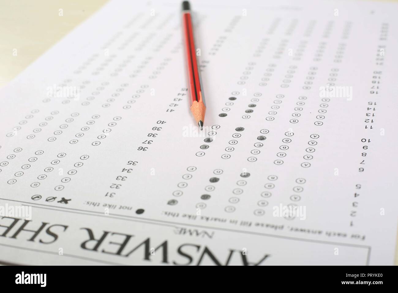 Picture of exam sheet and pencil. Isolated on white background Stock ...