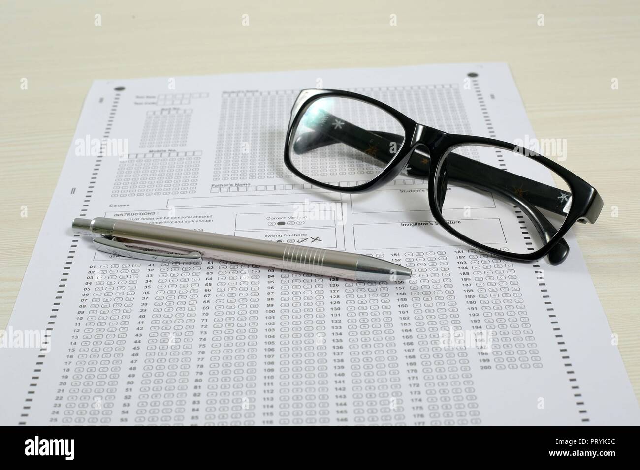 Picture of omr sheet, glasses and pen. Isolated on white background ...
