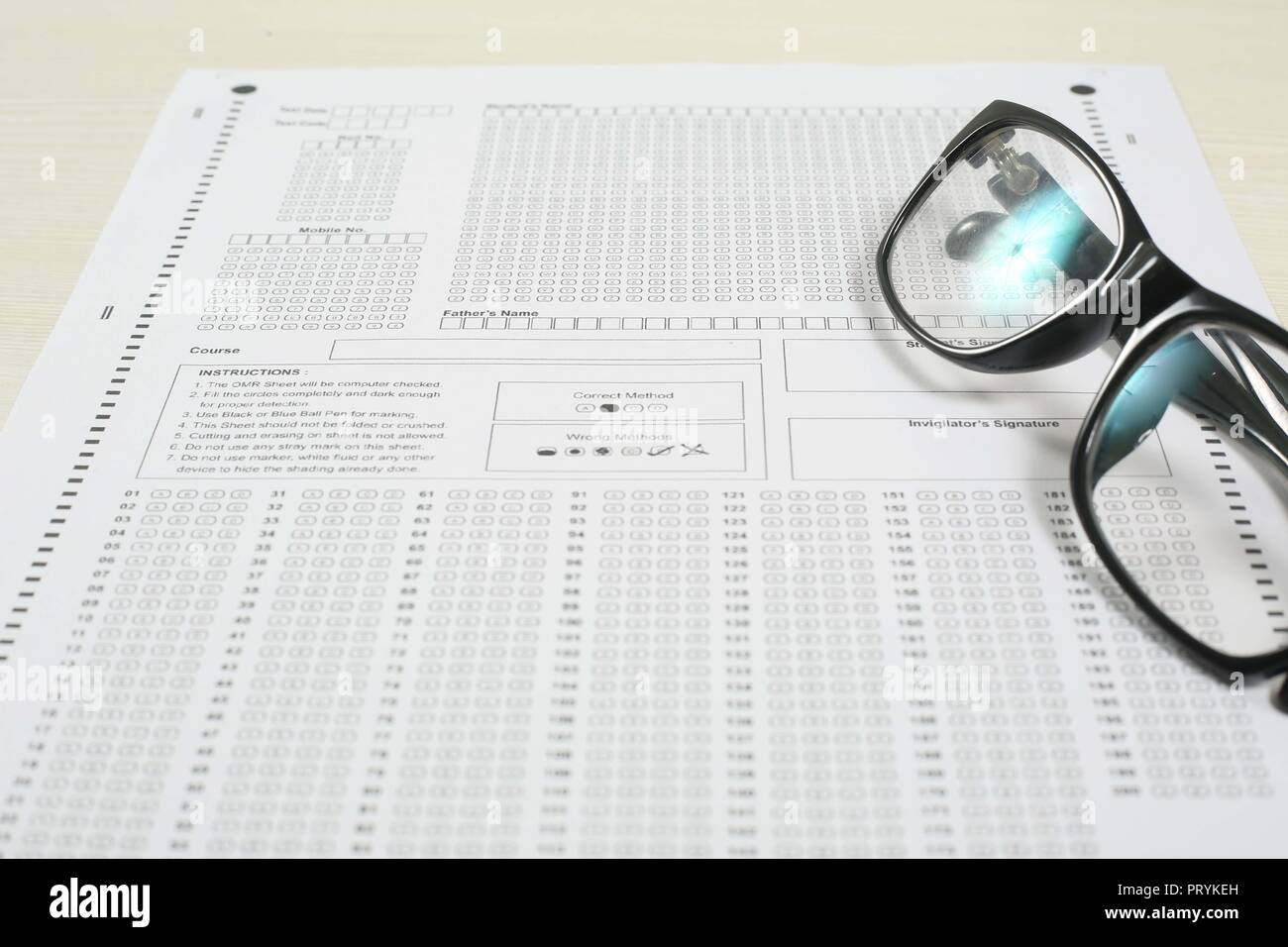 Picture of blank omr sheet and glasses. Isolated on white background ...