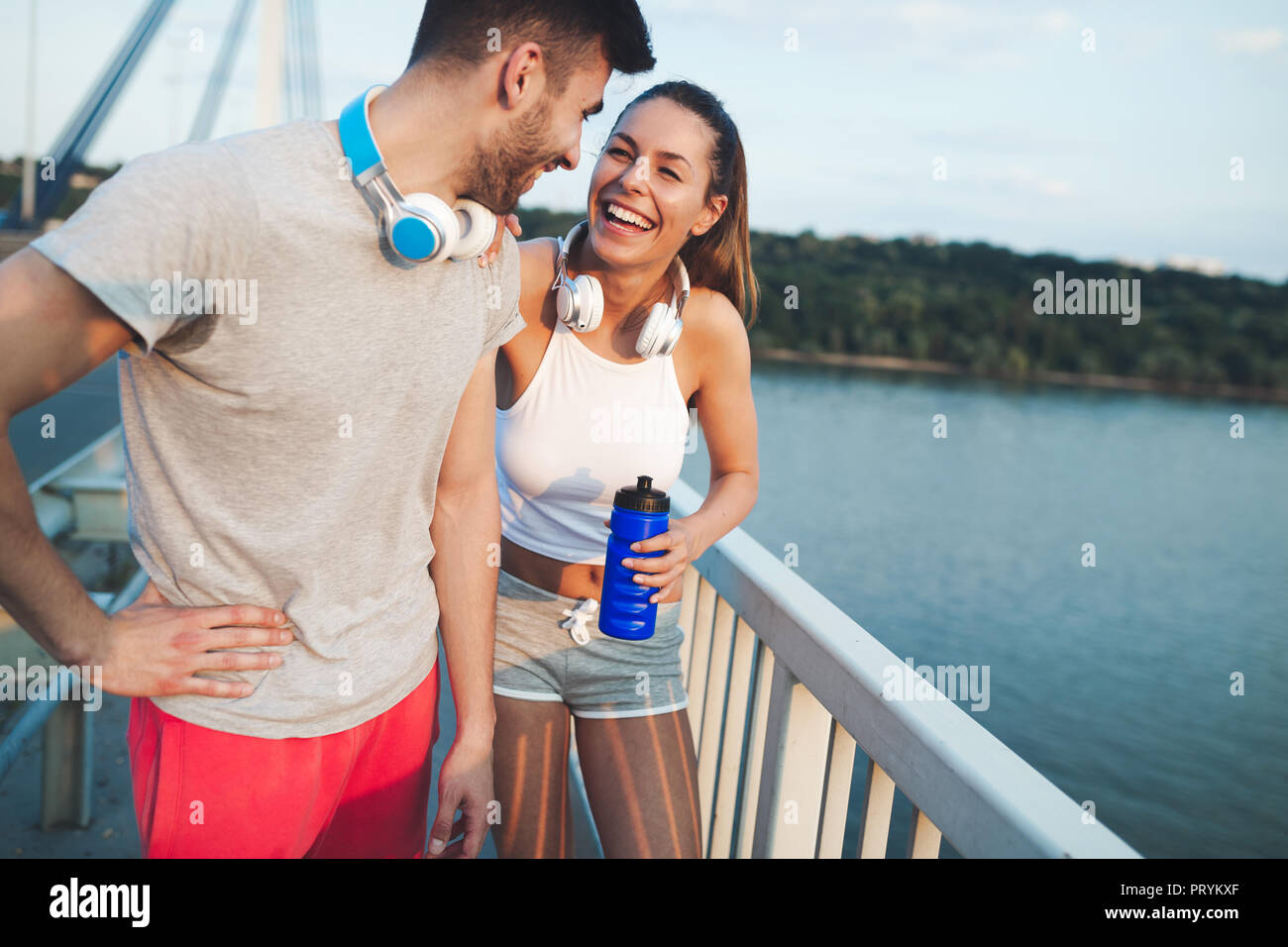 Friends fitness training together outdoors living active healthy Stock ...